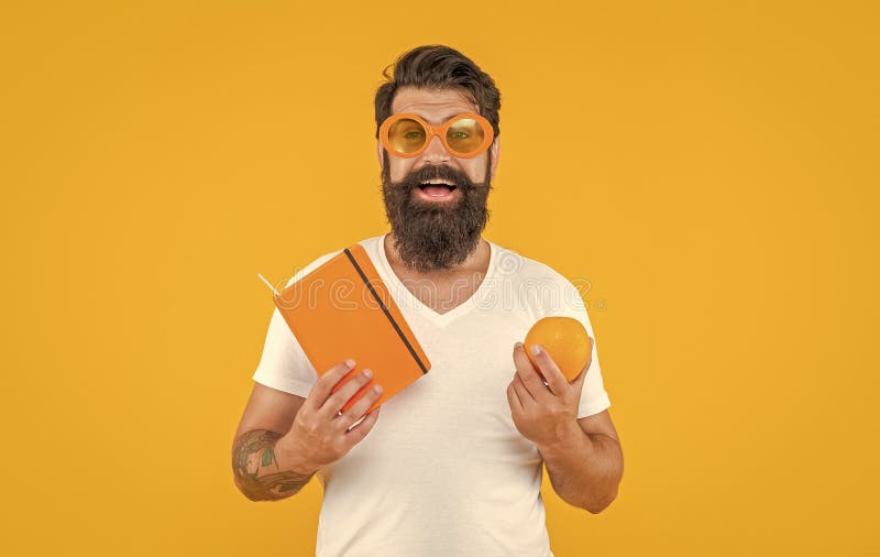 Glad Millennial Man with Planner in Studio. Millennial Man with Planner ...