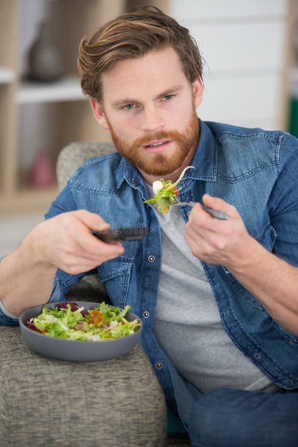 Glad Smiling Handsome Man Holding Plate with Salad Stock Photo - Image ...
