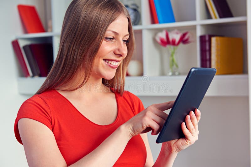 Woman using the tablet pc stock photo. Image of portable - 29856120