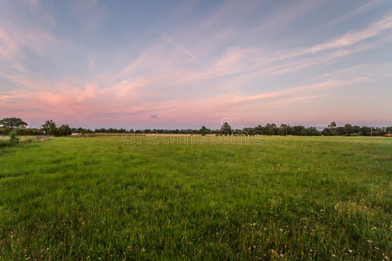 Glade at sunset stock image. Image of field, scenic, scenery - 58227973