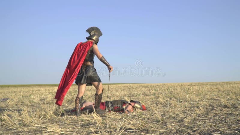 The Gladiator in Armor Turns Over the Lying Enemy and is Going To Kill ...