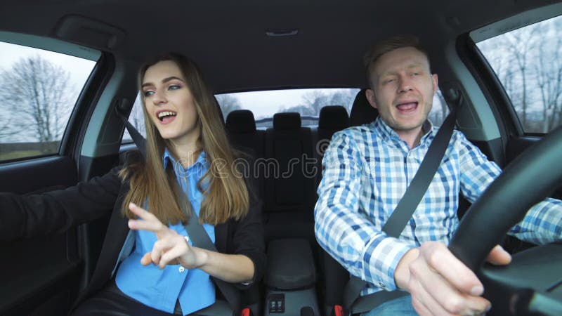 Glamorous Couple Riding in the Car, Girl Taking Funny Selfie, Man ...