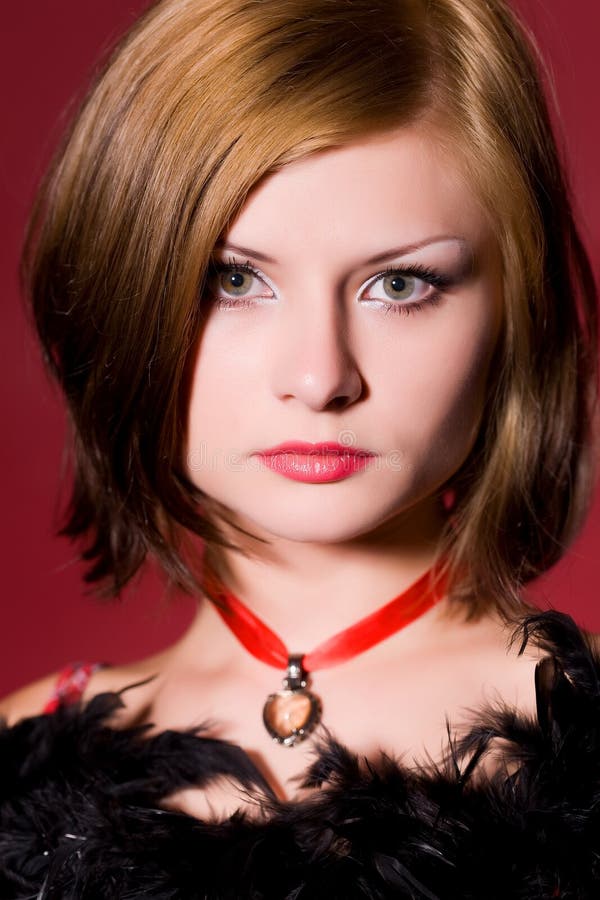 A Glamorous Girl Dressed in Black Body. a Model in Clothes Poses for ...