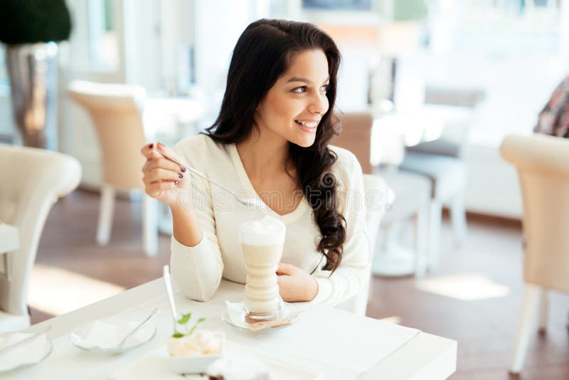 Glamorous Young Lady Drinking Coffee in a Beautiful Cafe Stock Photo ...