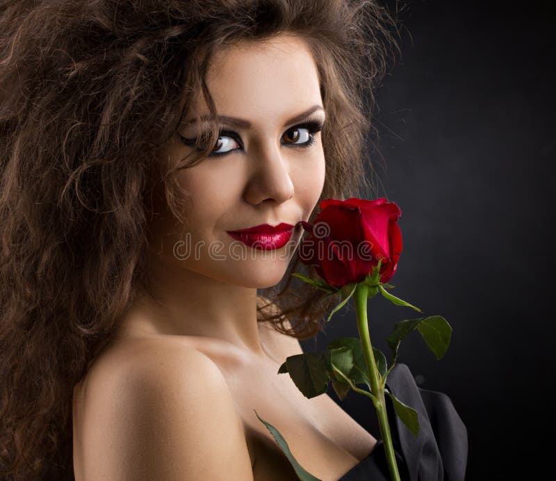Young Beauty Smelling Bouquet of Red Roses. Pleasure & Harmony Stock ...
