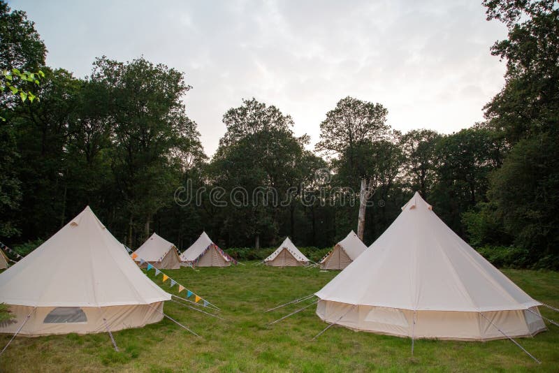 Glamping Teepees in a Circle in a Field Stock Image - Image of luxury ...