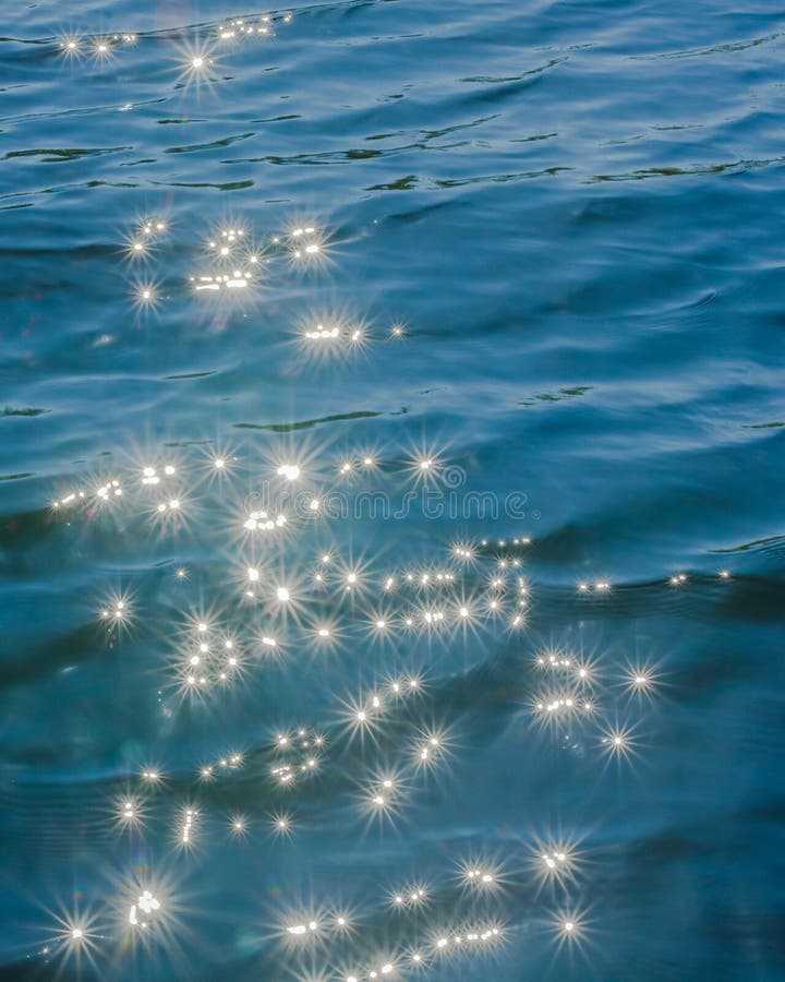 Glare of the Reflected Sun on the Surface of the Water. Stock Image ...