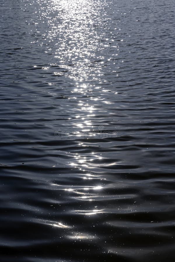 Glare from Sunlight on the Surface of the Lake Water Stock Photo ...