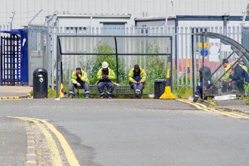 Glasgow, UK, June 15th 2024, Construction Works Sat Using Phones during ...