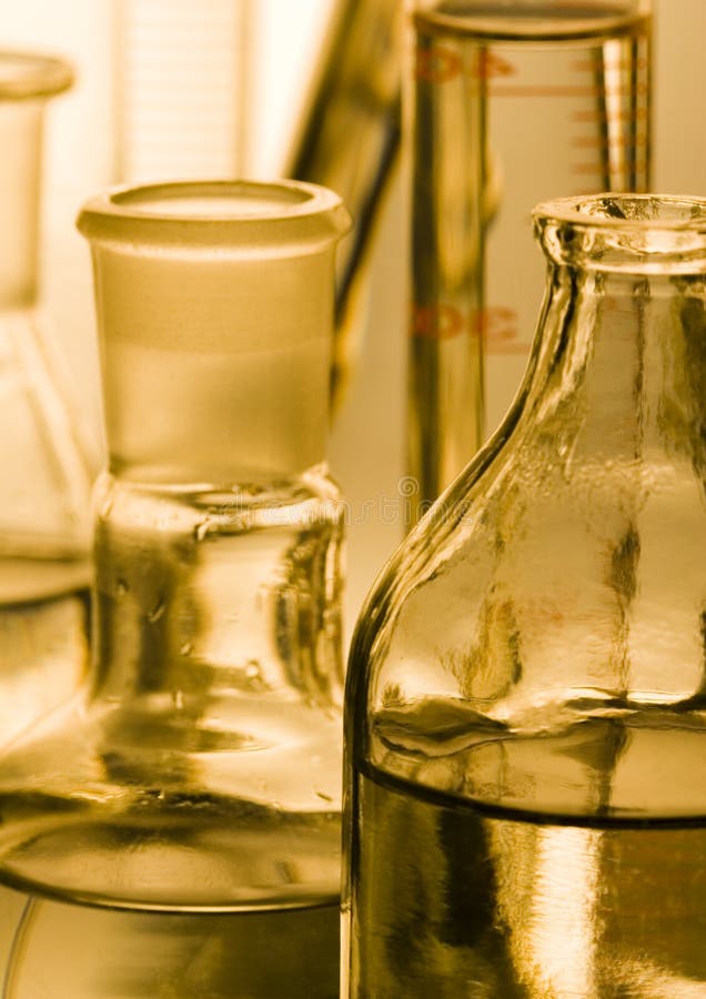 Gold in laboratory glass stock photo. Image of biology - 11398636