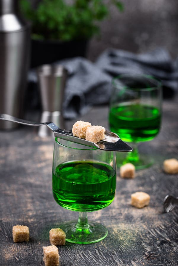 Glass of Absinthe with Cane Sugar Stock Photo - Image of absinth, brown ...