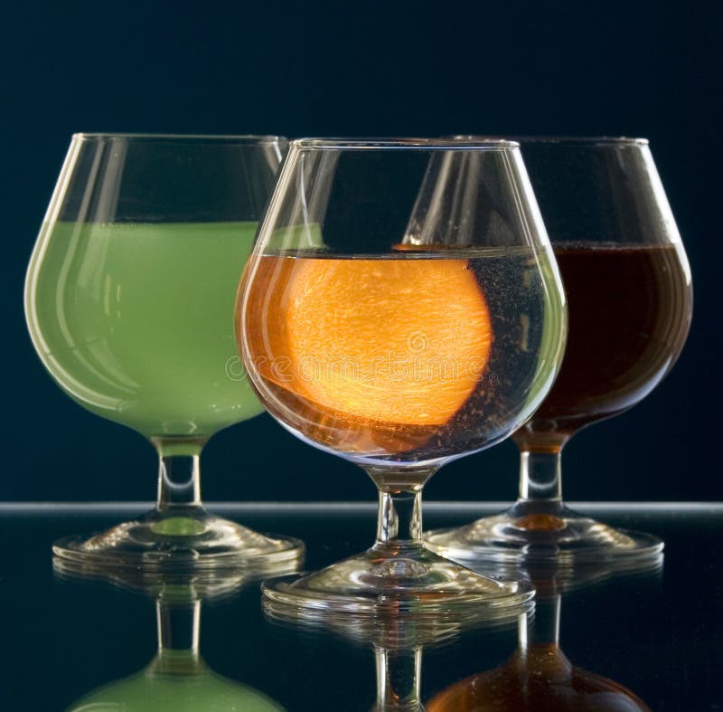 Glass of alcohol drink stock image. Image of drunks, appetizers - 22383647