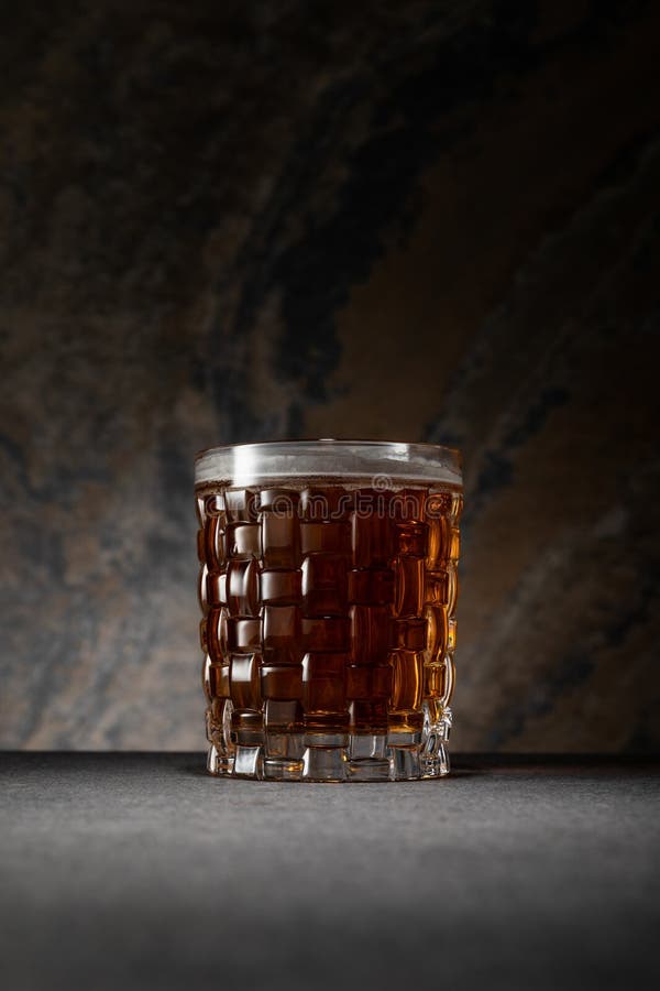Glass of Alcohol Beer on Textured Stock Photo - Image of stone, black ...
