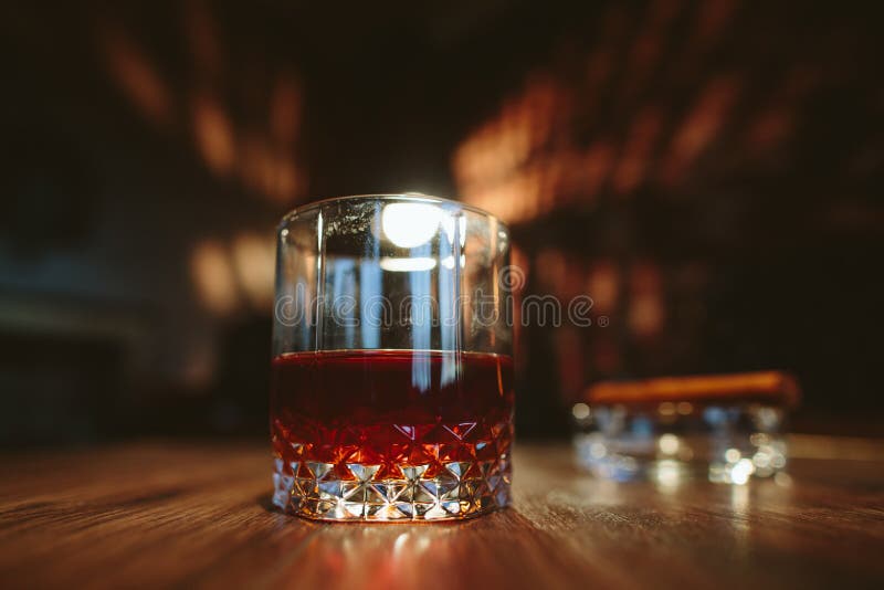 A glass with alcohol stock photo. Image of relax, scotch - 100258444