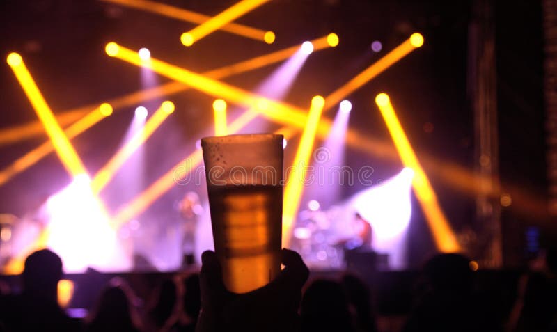 A Glass of Alcohol at a Concert of Live Music Stock Image - Image of ...