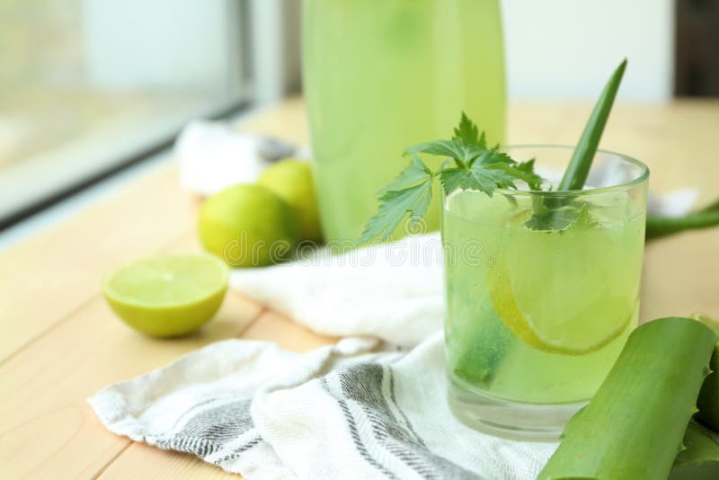 Glass of Aloe Vera Cocktail on Wooden Table Stock Photo - Image of ...
