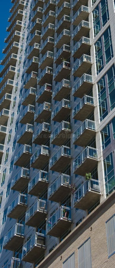 Modern High-Rise Apartment Building Stock Image - Image of many, bright ...