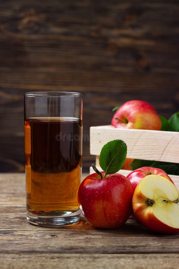 Glass of Apple Juice with Red Apples Stock Photo - Image of apple, leaf ... Glass of Apple Juice with Red Apples Stock Photo - Image of apple, leaf ...