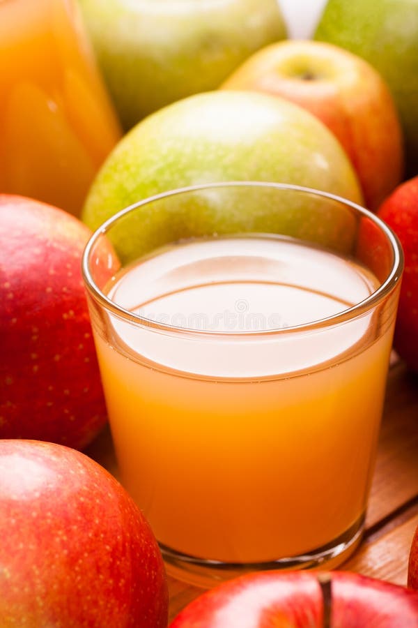 Glass of apple juice stock photo. Image of green, healthy - 62605502 Glass of apple juice stock photo. Image of green, healthy - 62605502
