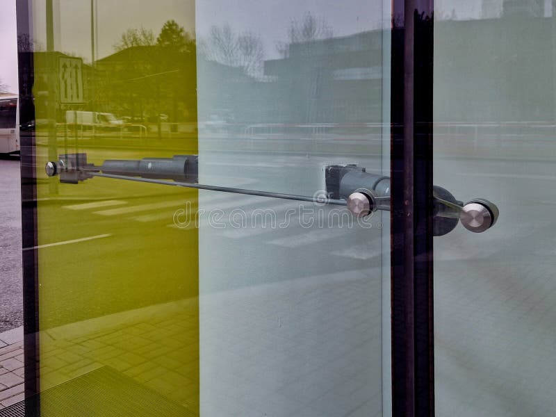 The Glass is Attached To the Wall Using Screws and Washers Intende ...