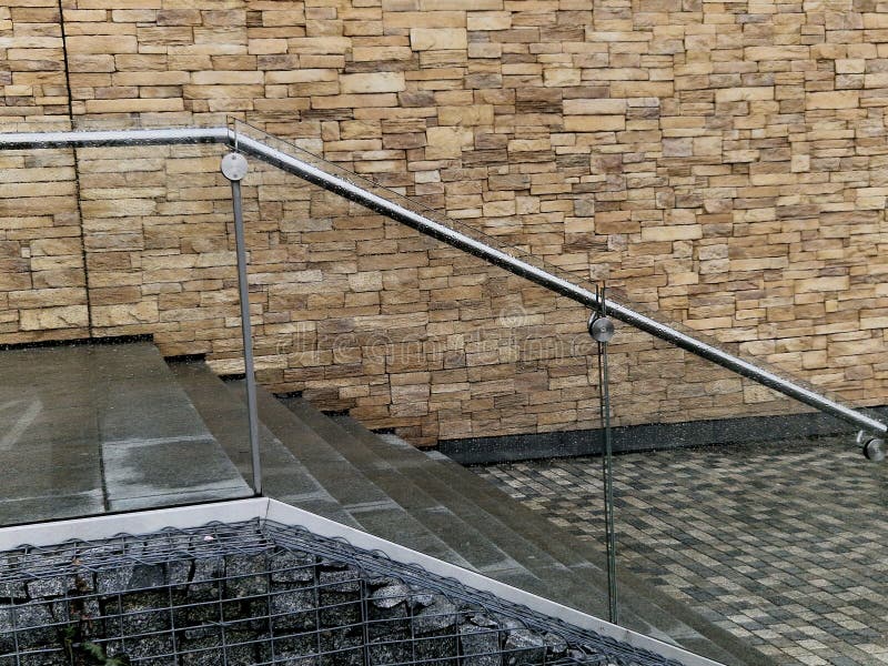 Glass is Attached To the Wall Using Screws and Washers Intended Stock ...