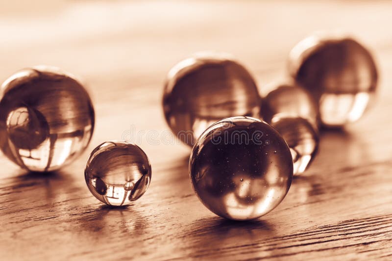 Glass Balls of Different Sizes Tinted in Gold. Stock Image - Image of ...
