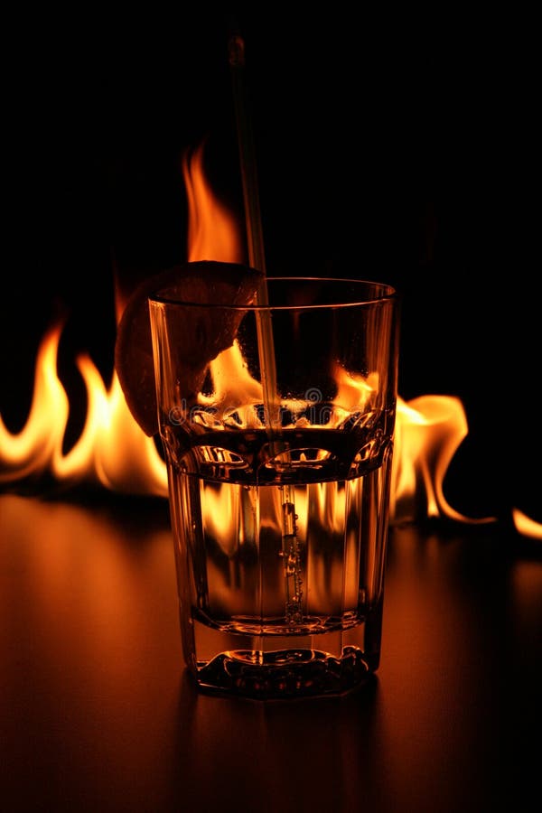 Glass on bar rack in fire stock image. Image of yellow - 10844627