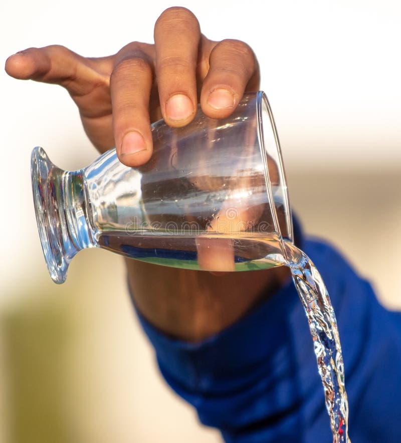 Glass Beaker with Water in Hand. Stock Image - Image of hand, cold ...