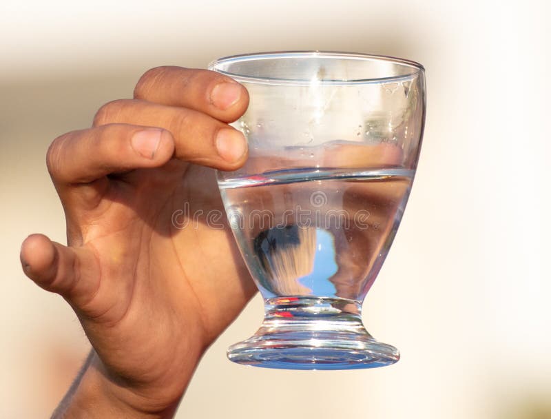 Glass Beaker with Water in Hand. Stock Image - Image of indoor ...