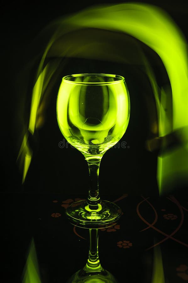 A Glass in the Beautiful Green Light Stock Image - Image of phones ...