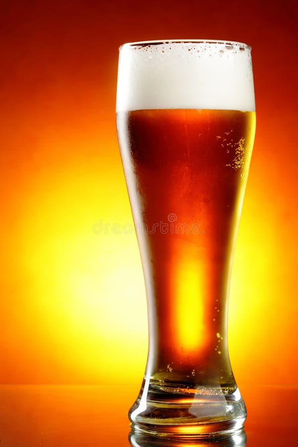 Frosty Glass of Red Beer Isolated on a White Stock Image - Image of ...