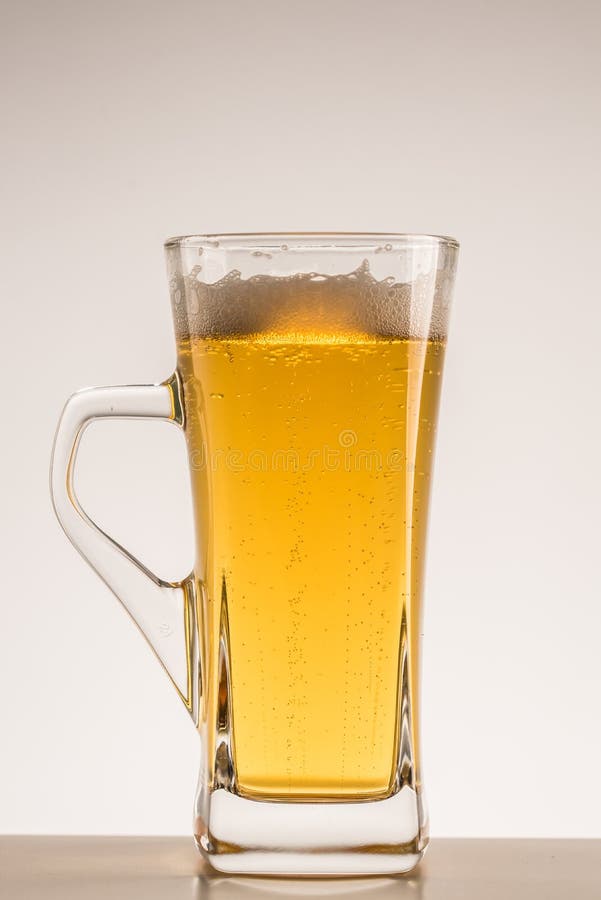 Glass of beer close up stock image. Image of froth, liquid - 96602379
