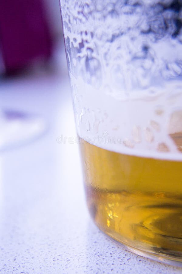 Glass of beer half full stock photo. Image of background - 90522018