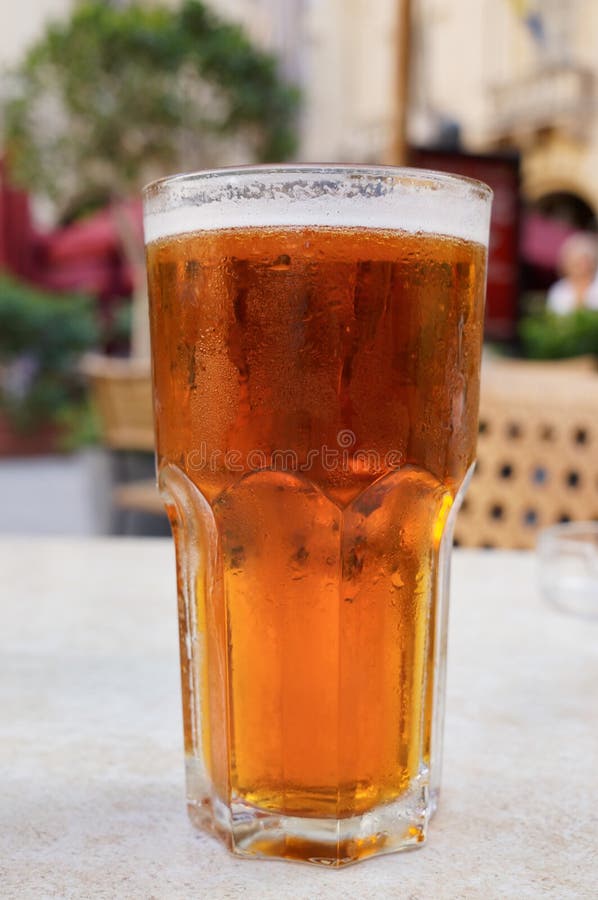 Glass of Beer on Restaurant Table Stock Image - Image of full ...