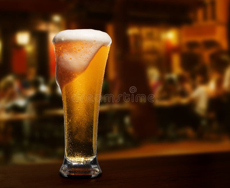 Glass of Beer on a Street Bar Table. Stock Photo - Image of side ...