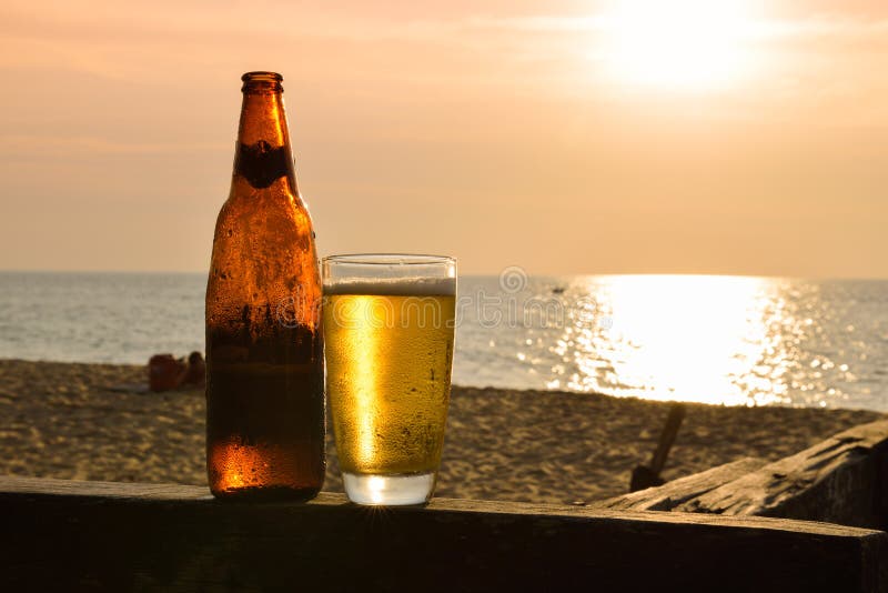 Bottle of Beer on the Beach at Sunset Stock Image - Image of table ...