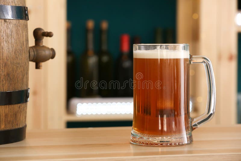 Glass of Beer on Table in Bar Stock Photo - Image of cool, natural ...