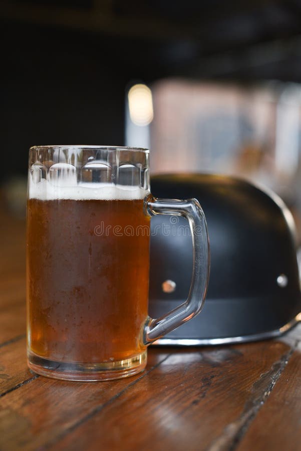 Glass of Beer on Wooden Table. Beer in a Glass Stock Photo - Image of ...