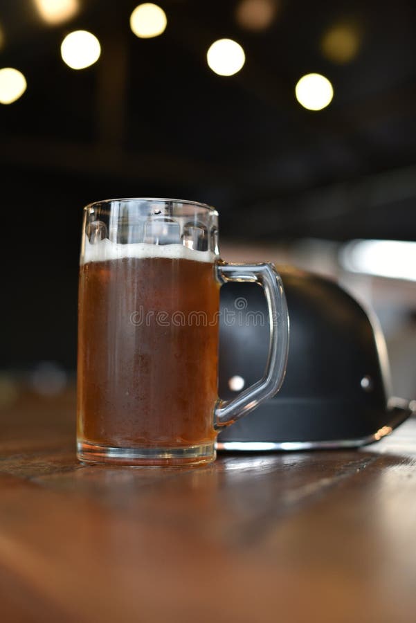 Glass of Beer on Wooden Table. Beer in a Glass Stock Image - Image of ...