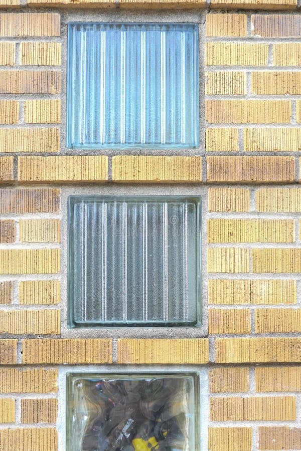 Glass Block Windows in a Brick Wall Stock Photo - Image of exterior ...