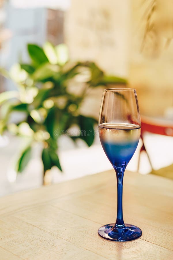 Glass of Blue Color with Champagne Table I Stock Image - Image of ...