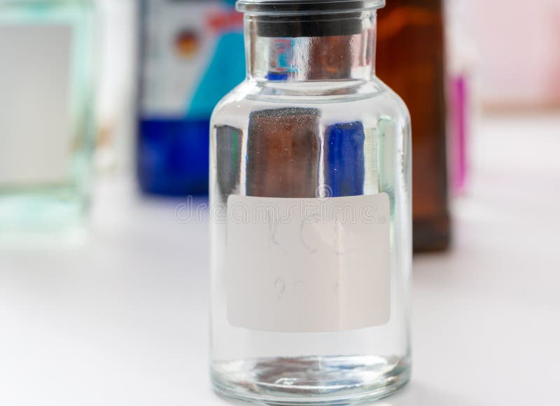 Glass Bottle with Chemicals Stock Photo - Image of science, laboratory ...