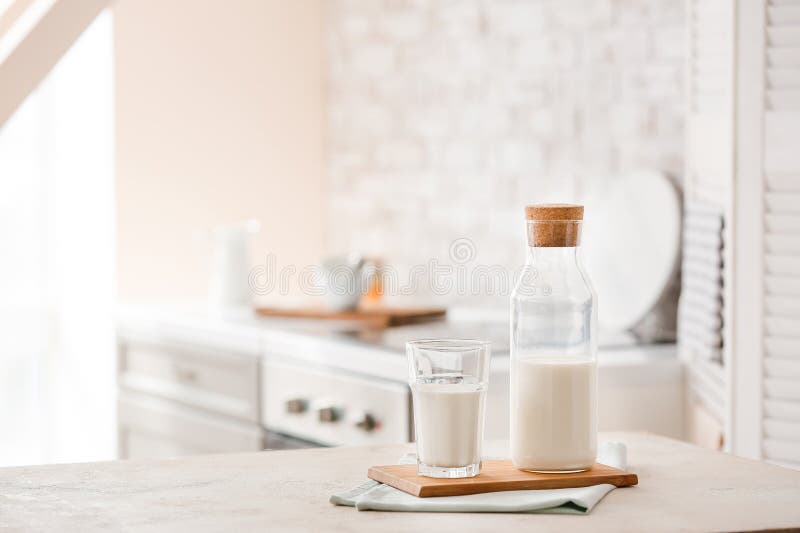 Glass and Bottle of Fresh Milk on Table Stock Photo - Image of drinking ...