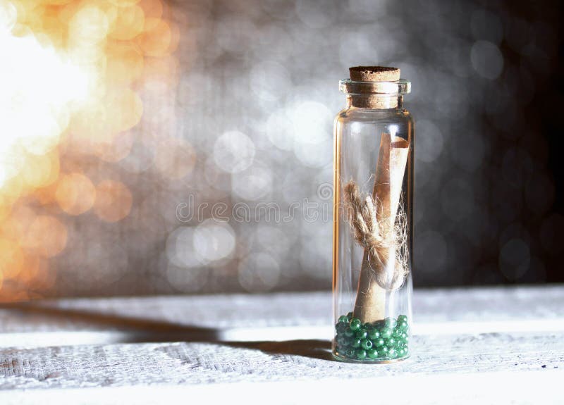 Note in a Glass Bottle. Stands on White Painted Wooden Boards Stock ...