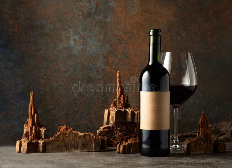 Glass and Bottle of Red Wine with Pieces of Old Wood on a Rusty ...