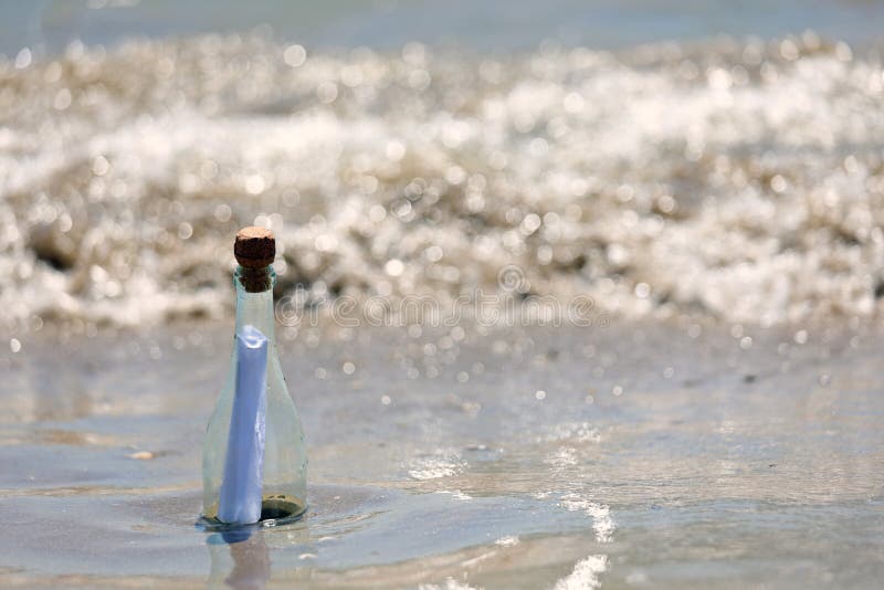Glass Bottle with Secret Message Inside by the Sea Stock Photo - Image ...