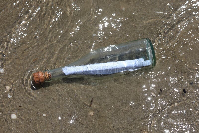 Glass Bottle with a Secret Message by the Sea Stock Photo - Image of ...