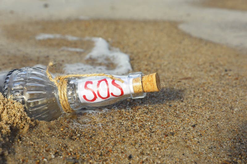Glass Bottle with SOS Message on Sand Near Sea Stock Image - Image of ...
