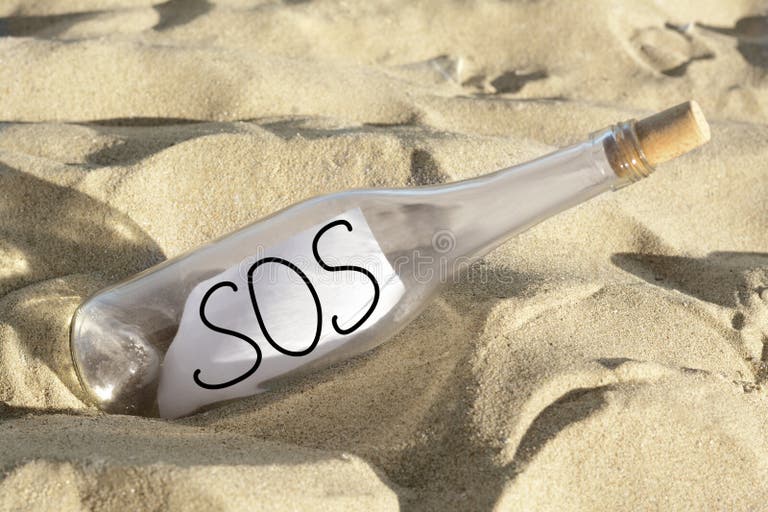 Glass Bottle with SOS Message on Sand Outdoors Stock Image - Image of ...