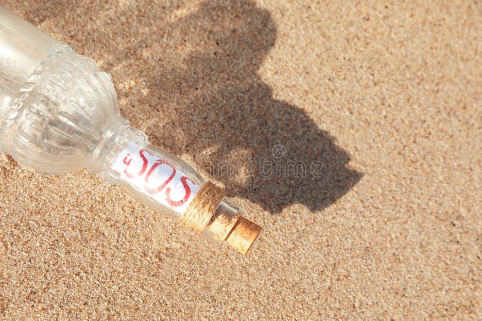 Glass Bottle with SOS Message on Sand, Top View Stock Image - Image of ...